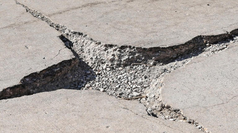 How to know when it's time to repair vs replace your concrete driveway