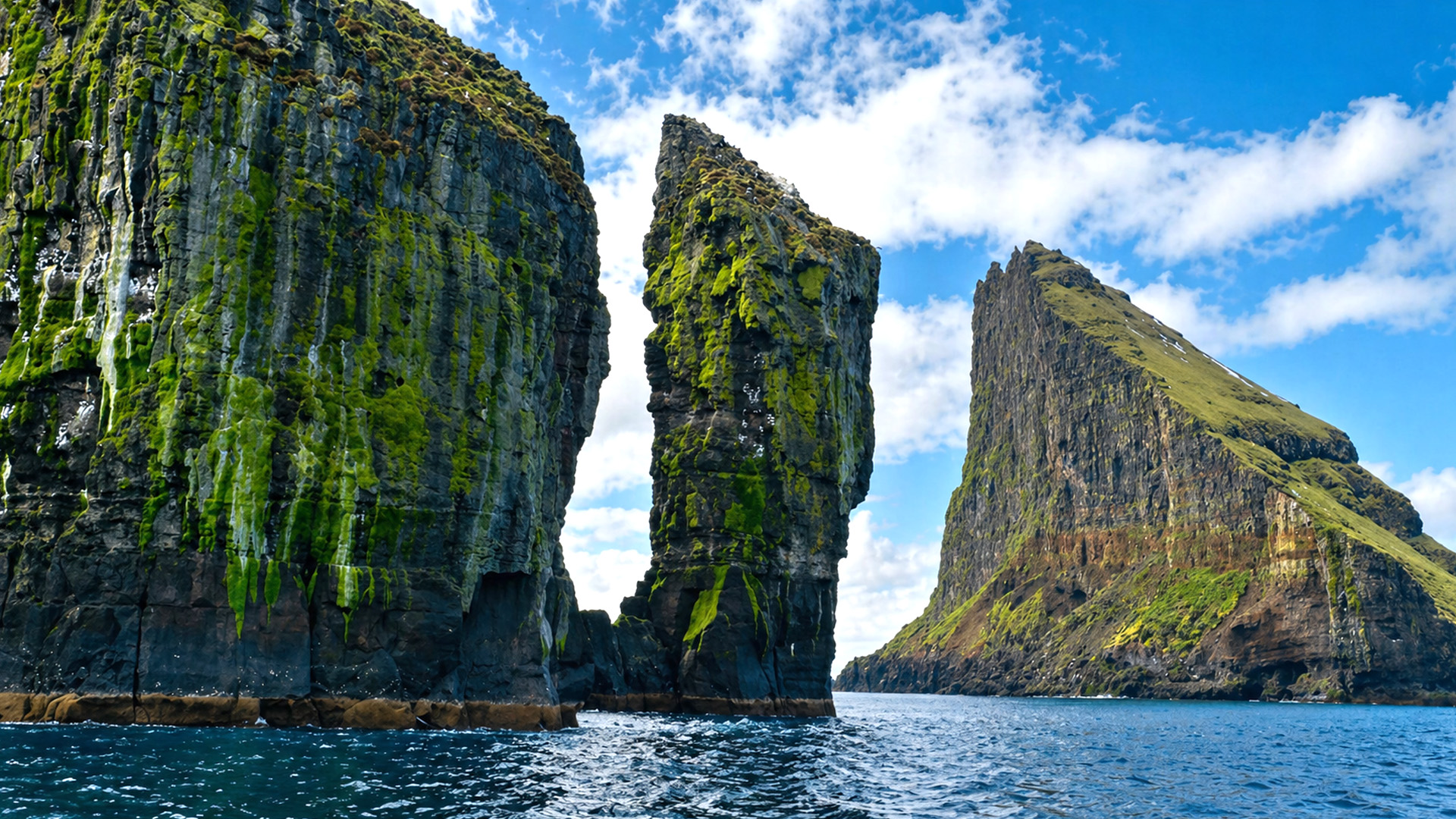Massive sea cliffs rising straight from the ocean