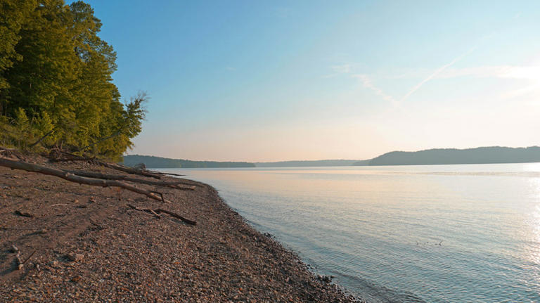 Indiana's biggest lake entirely within the state has sandy beaches ...