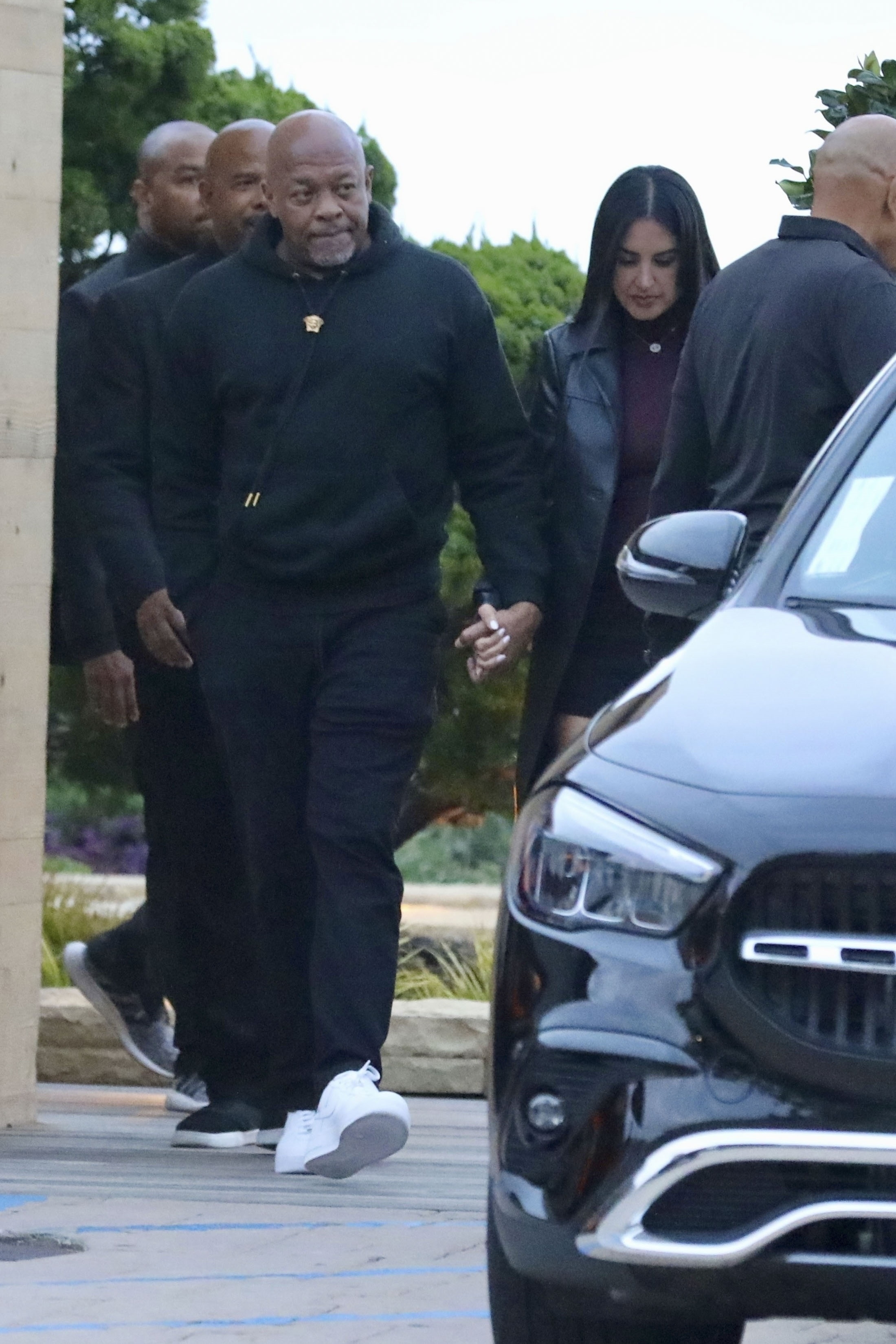 Dr. Dre, 61, holds hands with 'The Valley' star Michelle Saniei, 37, on ...