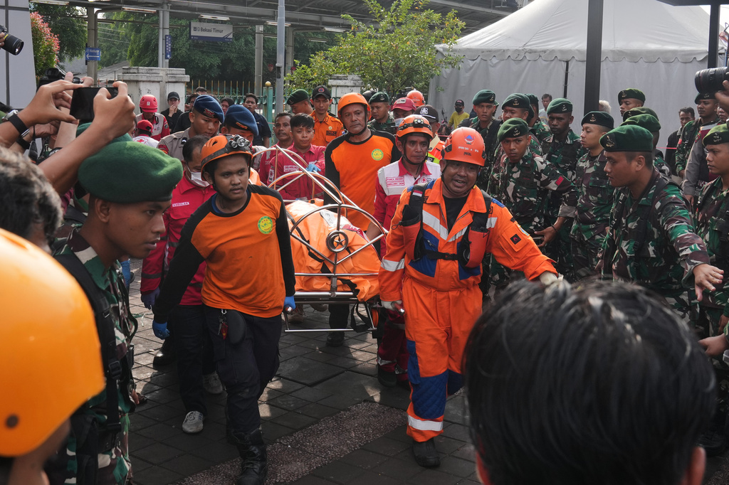 Rescuers recover last victims from Indonesia train wreck that killed 14 ...