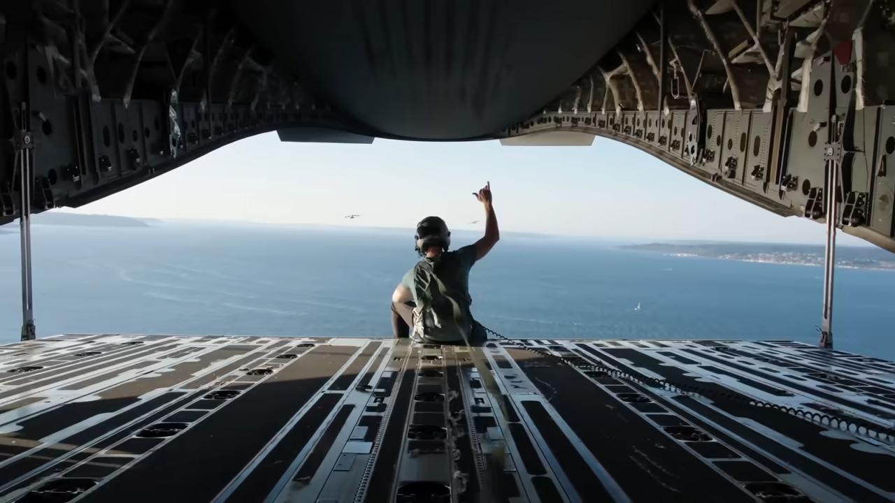 Watch a massive jet drop 70+ tons of cargo mid-air - "Perfect timing"