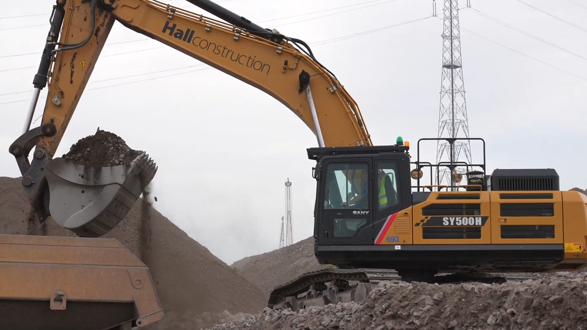 Giant SANY excavator moving heavy material effortlessly