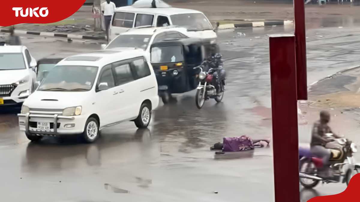 Outrage after woman collapses at busy roundabout as traffic continues ...