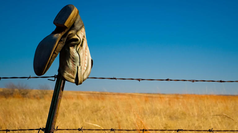 Ever notice a cowboy boot on top of someone's fence post? Here's why it ...