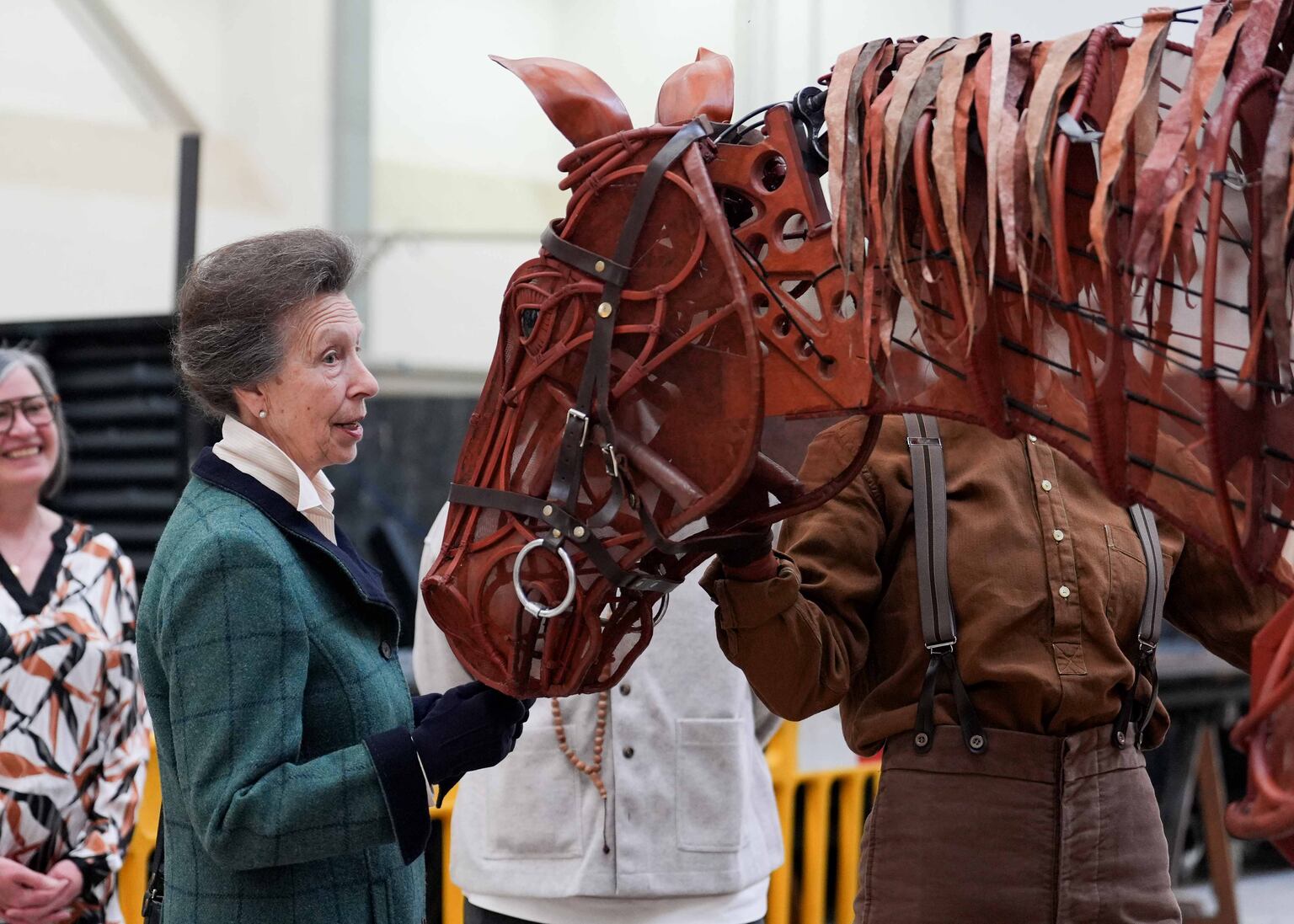 Princess Royal pats and jokes with puppet horse 'Joey' at National ...