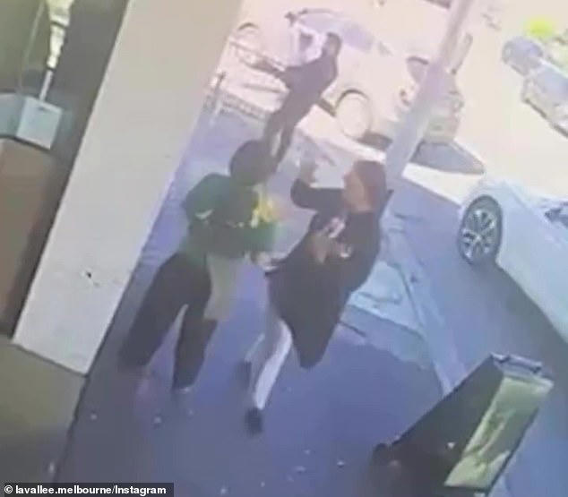 Outrage after woman is captured on CCTV smashing a plate into a ...