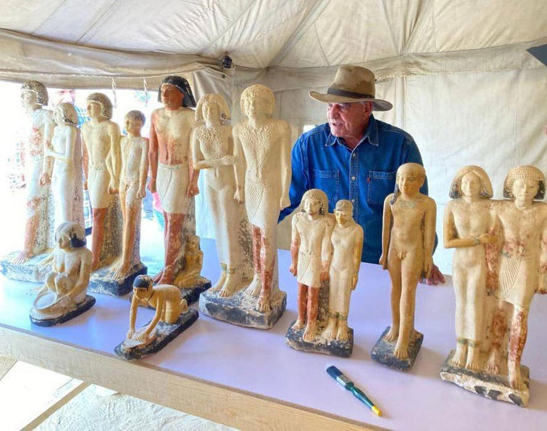 Archaeologists uncover a sealed tomb with a gold-covered mummy at the ...