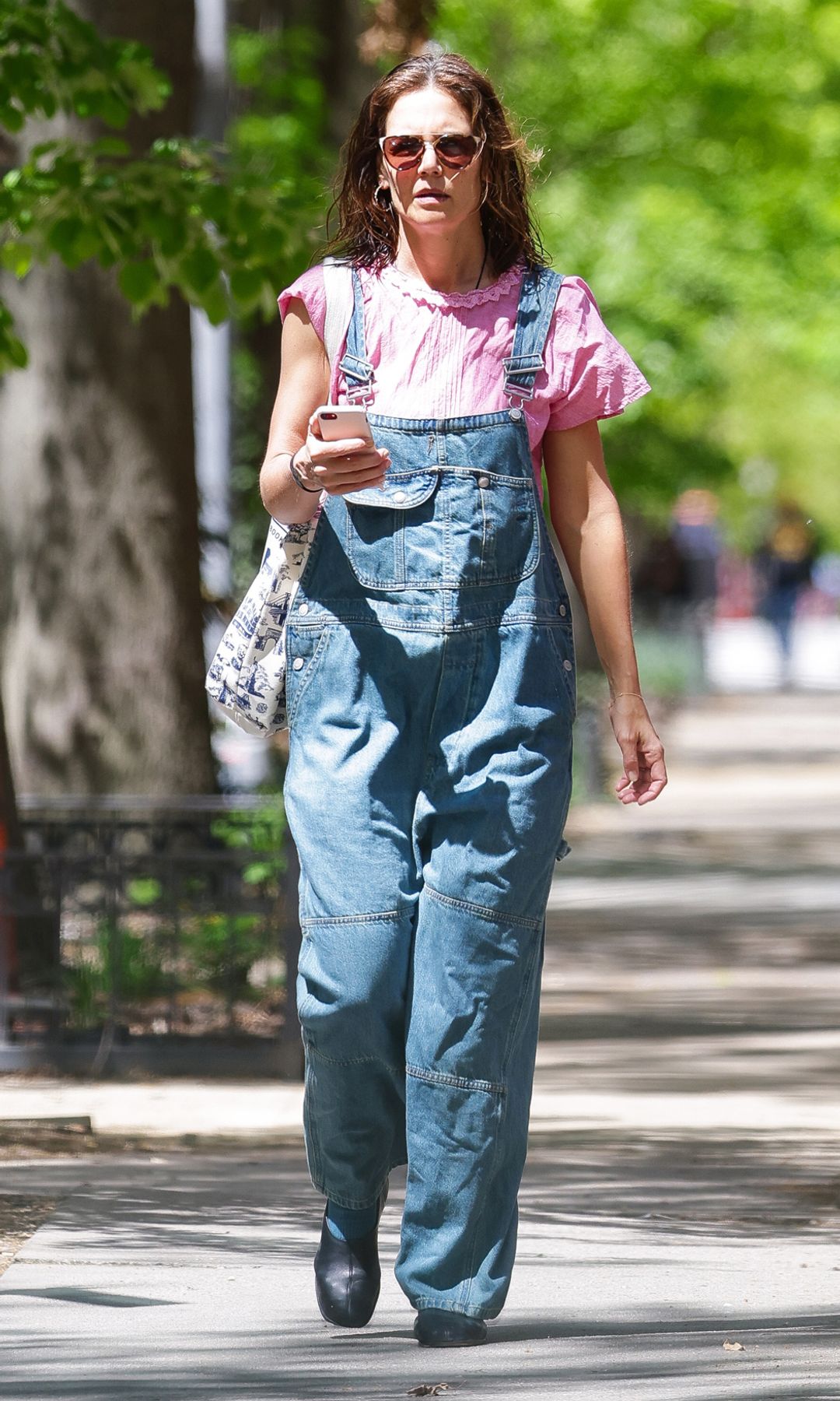 Katie Holmes steps out in playful overalls for a sunny spring day in ...