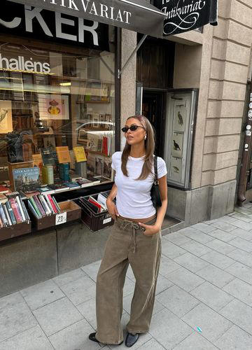Weder T-Shirt noch Bluse: Dieses sporty Oberteil lieben die Modeprofis ...