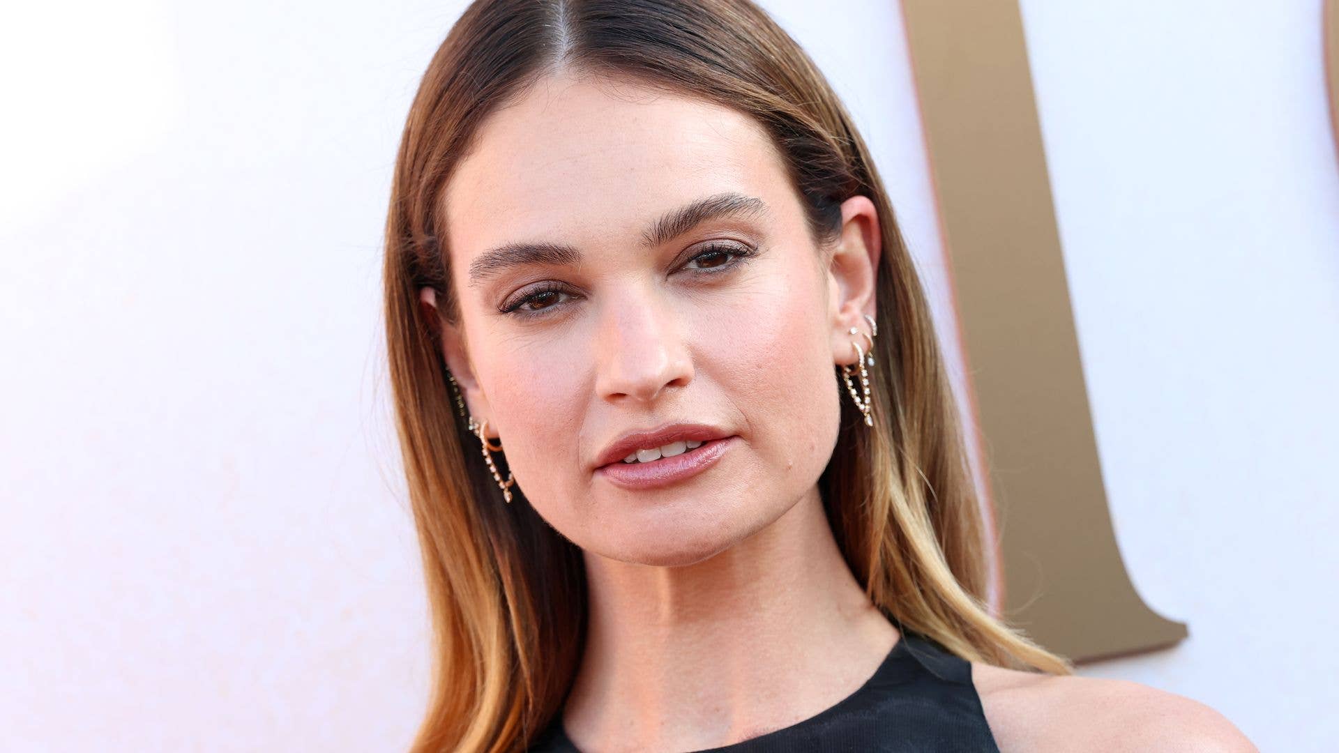 Lily James stuns in elegant ab-baring look revealing tiny tattoos