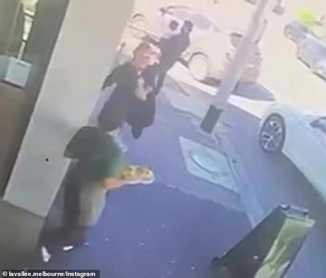Outrage after woman is captured on CCTV smashing a plate into a ...