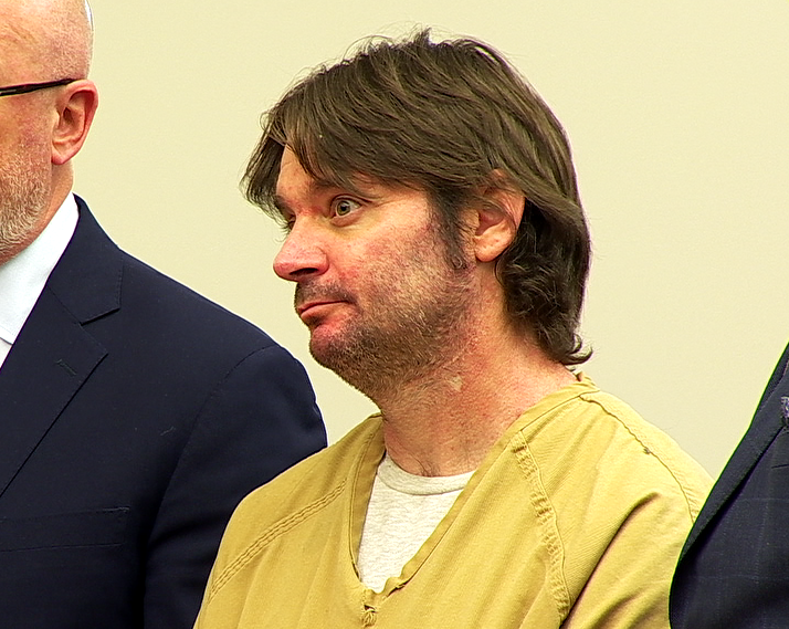 Man smirks in court as he admits to murdering his son, girlfriend