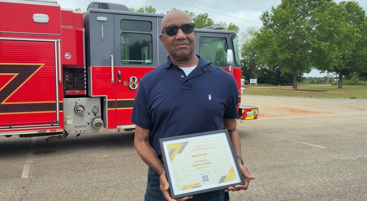 Georgia man pulls toddler, teen from burning vehicles