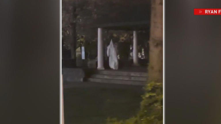 West Warwick police investigating viral video of person in white robe ...