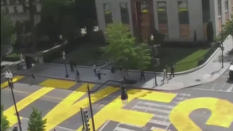 Artist repaints Black history mural telling Arlington neighborhood's ...