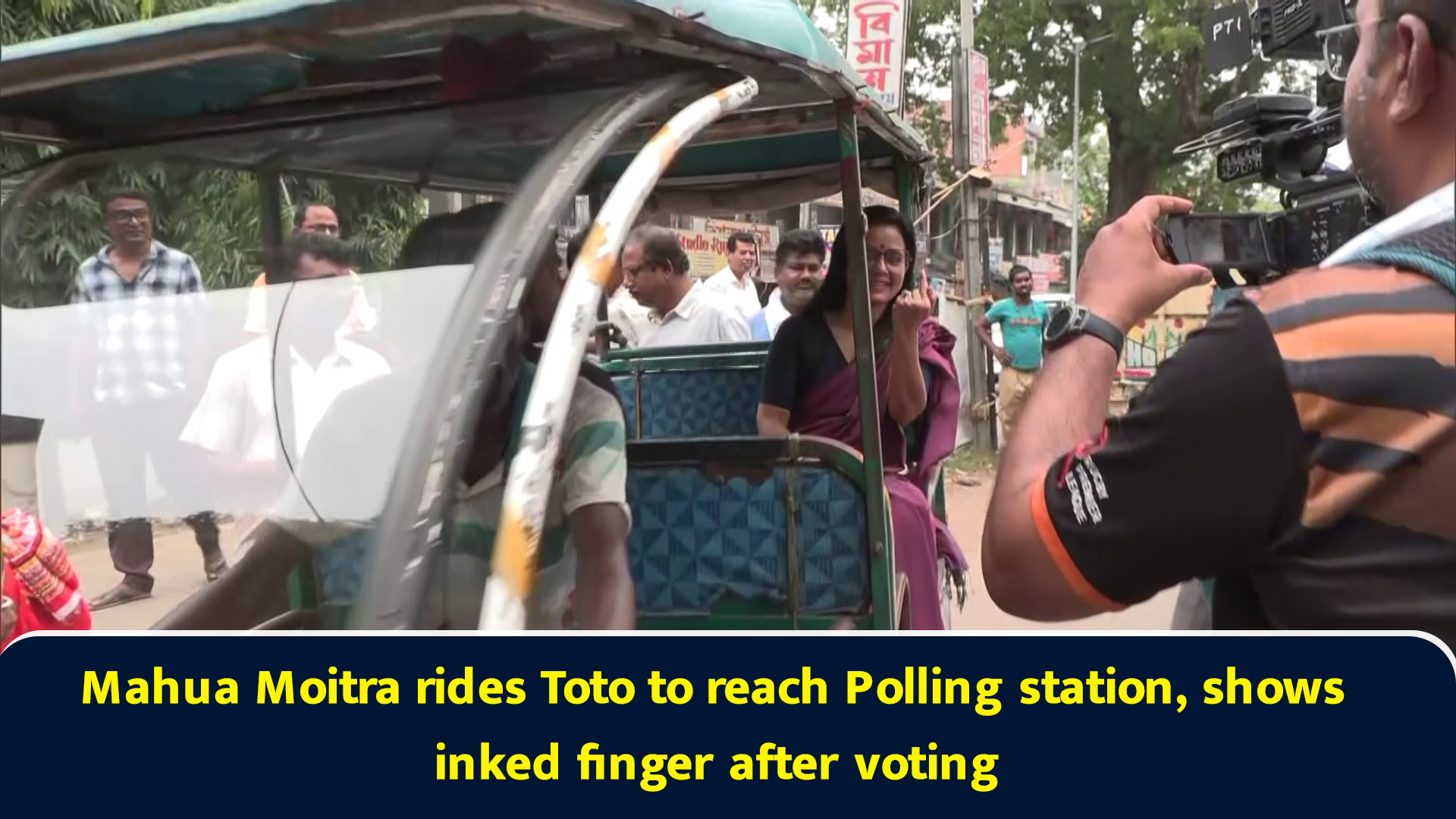 Mahua Moitra rides Toto to reach polling station, shows inked finger ...