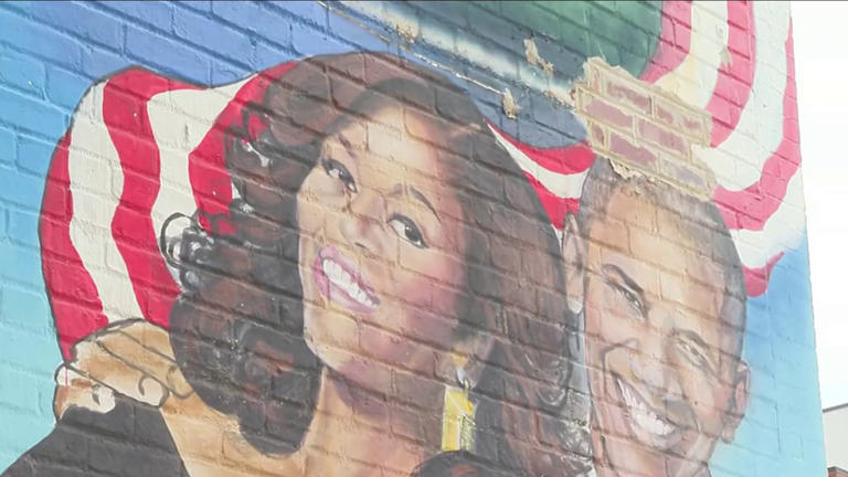 Artist repaints Black history mural telling Arlington neighborhood's ...