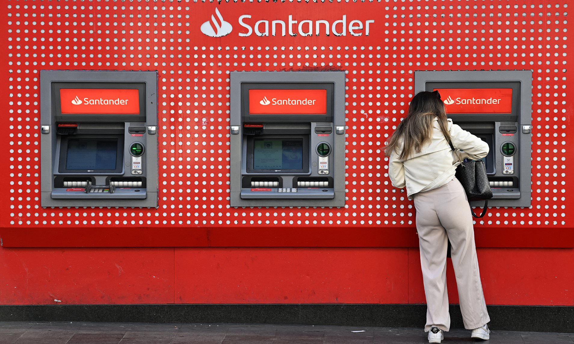 Santander takes hit from cost of car finance scandal as it slashes ...