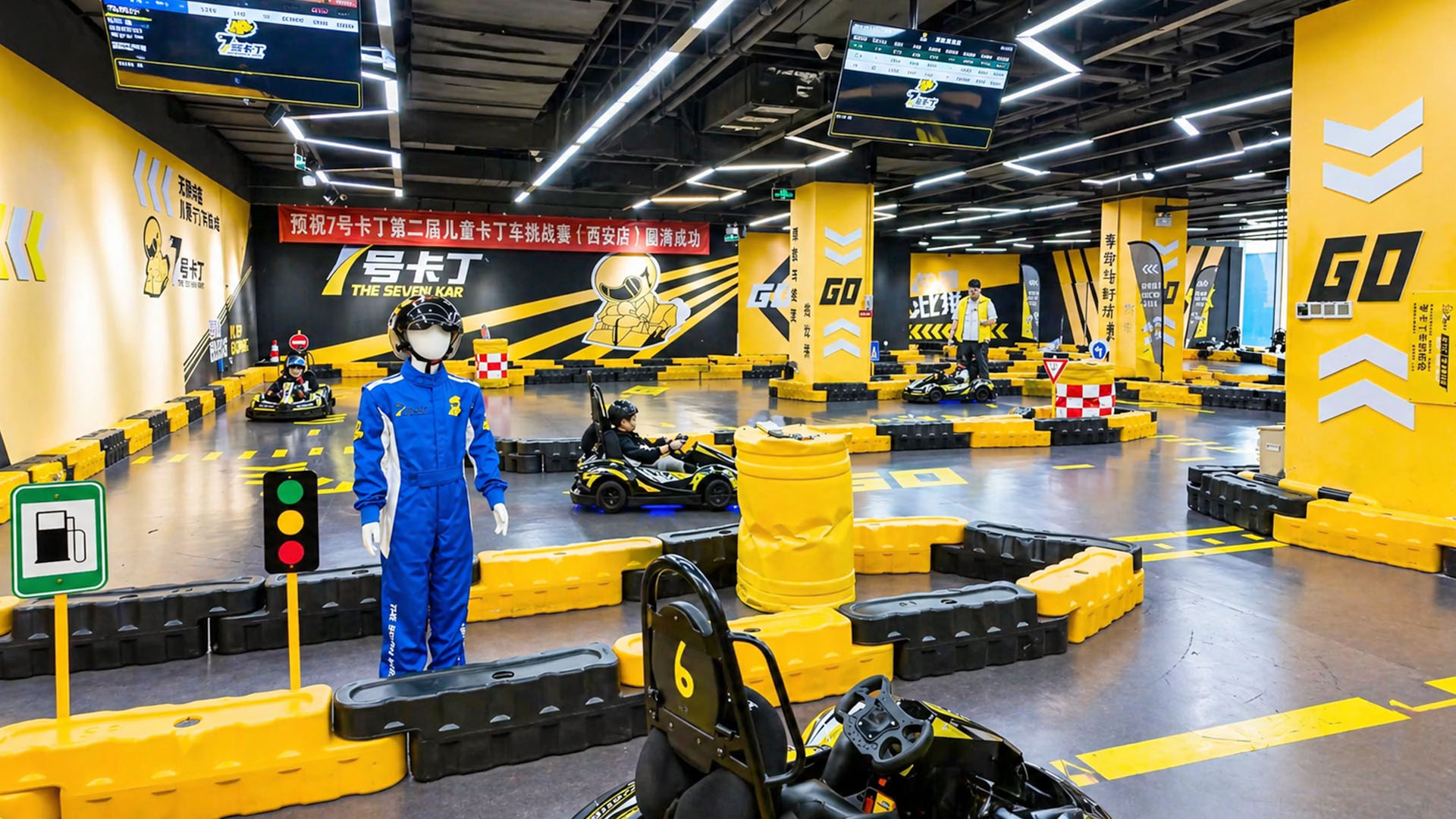 An indoor racing track hidden inside a futuristic shopping complex