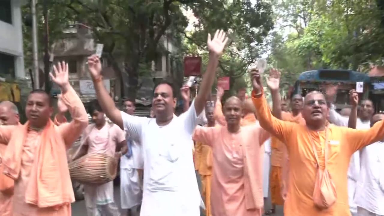 ISKCON monks chant 'Hare Krishna' on their way to vote in Kolkata