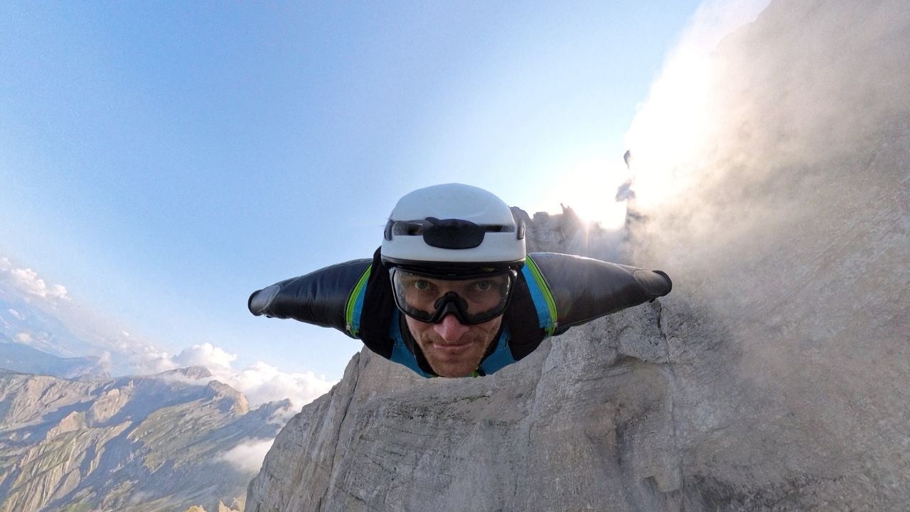 Man jumps into open air then flies just feet above the field