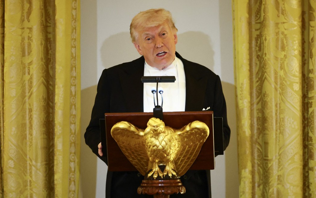 Trump holds machine gun in bizarre 'no more Mr Nice Guy' threat to Iran ...