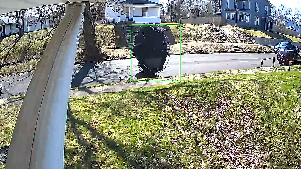 Runaway trampoline lands on parked car