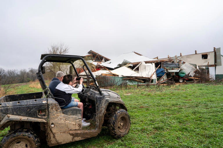Dozens of tornadoes rip down power lines, roofs in severe storm surge