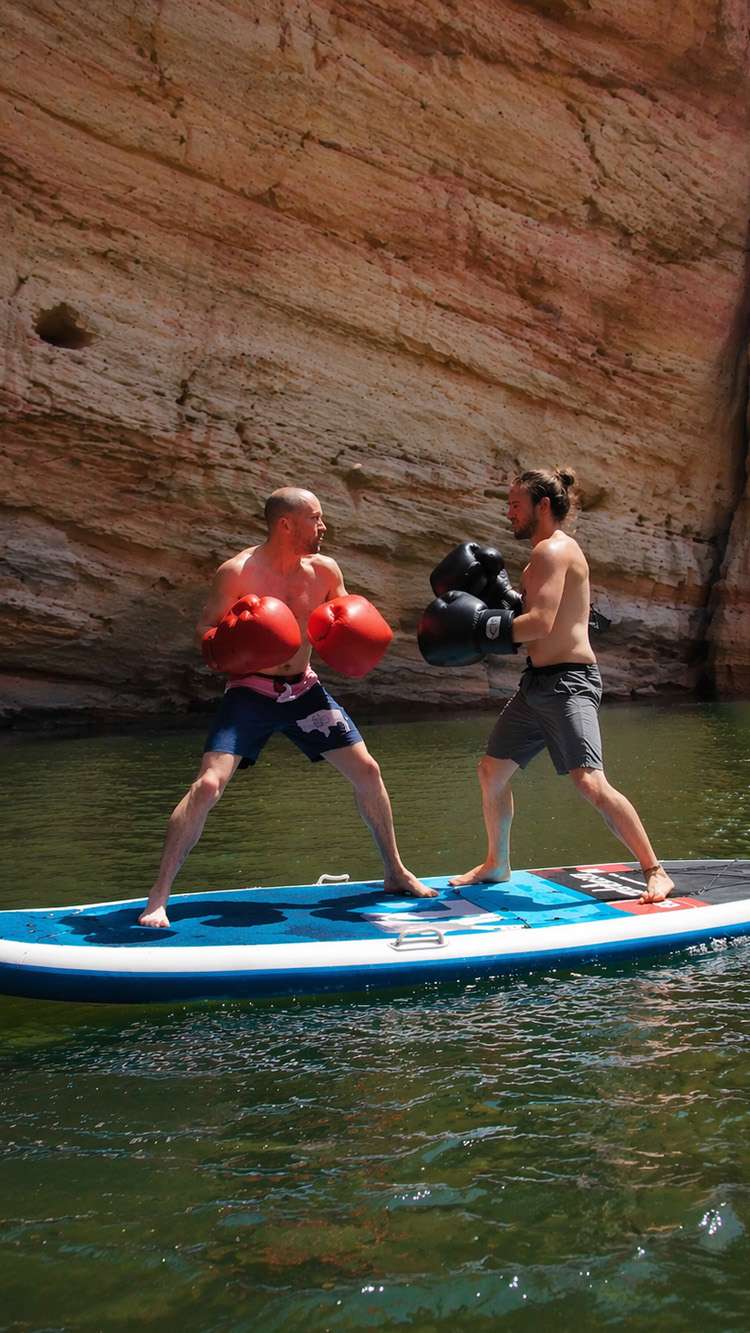 Paddle board boxing shows unstable fight action