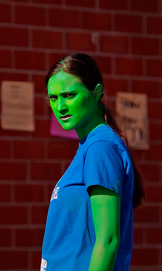 Girl has green skin