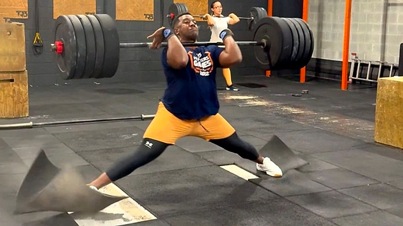 Weightlifter loses control as gym mats slip beneath him during max lift ...