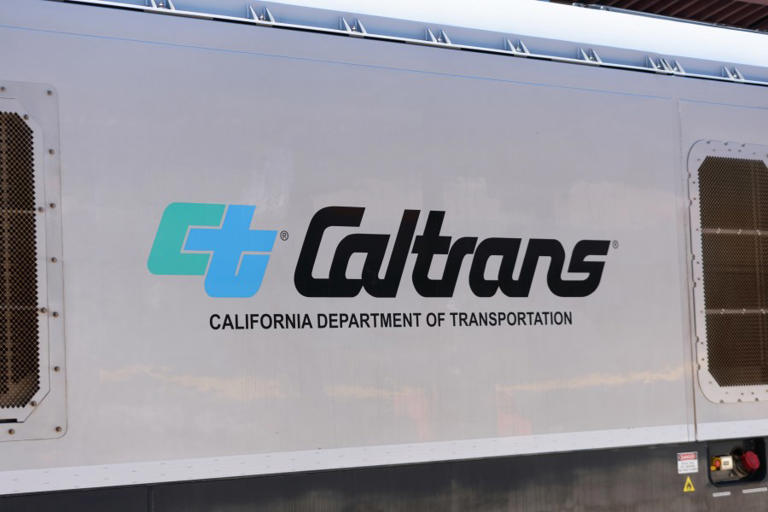 Overturned semi-trailer blocks connector on I-805 near Clairemont
