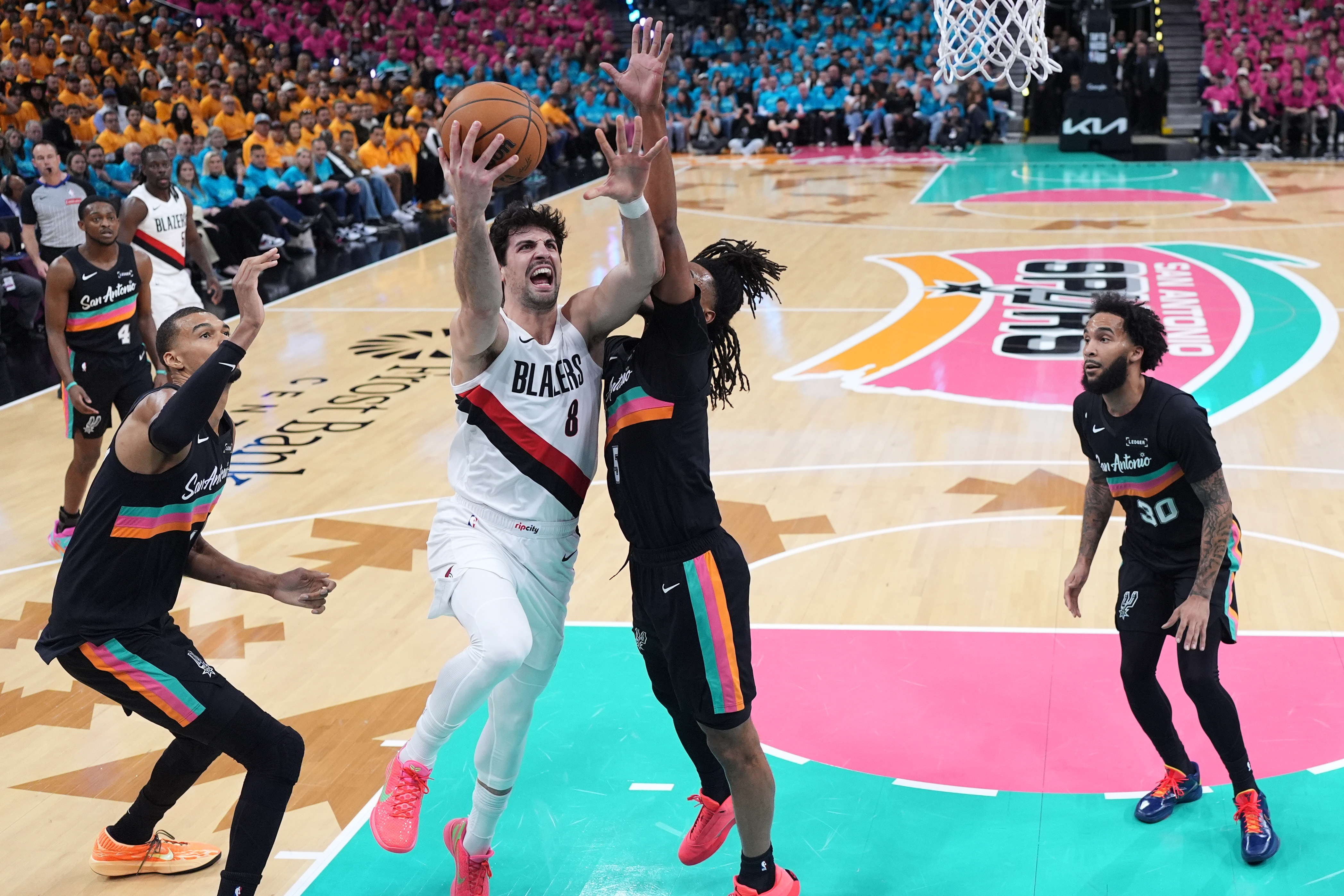 Spurs dress crowd in brightly colored Fiesta-themed playoff shirts