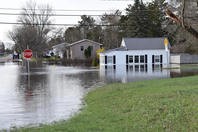 Northern Michigan city's sewage treatment hampered by flooding