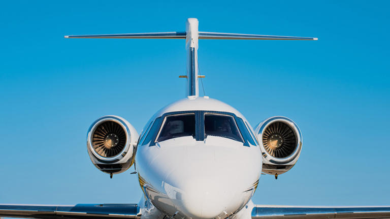 Why do most private jets have engines at the back?