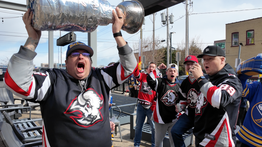 Buffalo Sabres fans celebrate as the team beats the Boston Bruins in ...