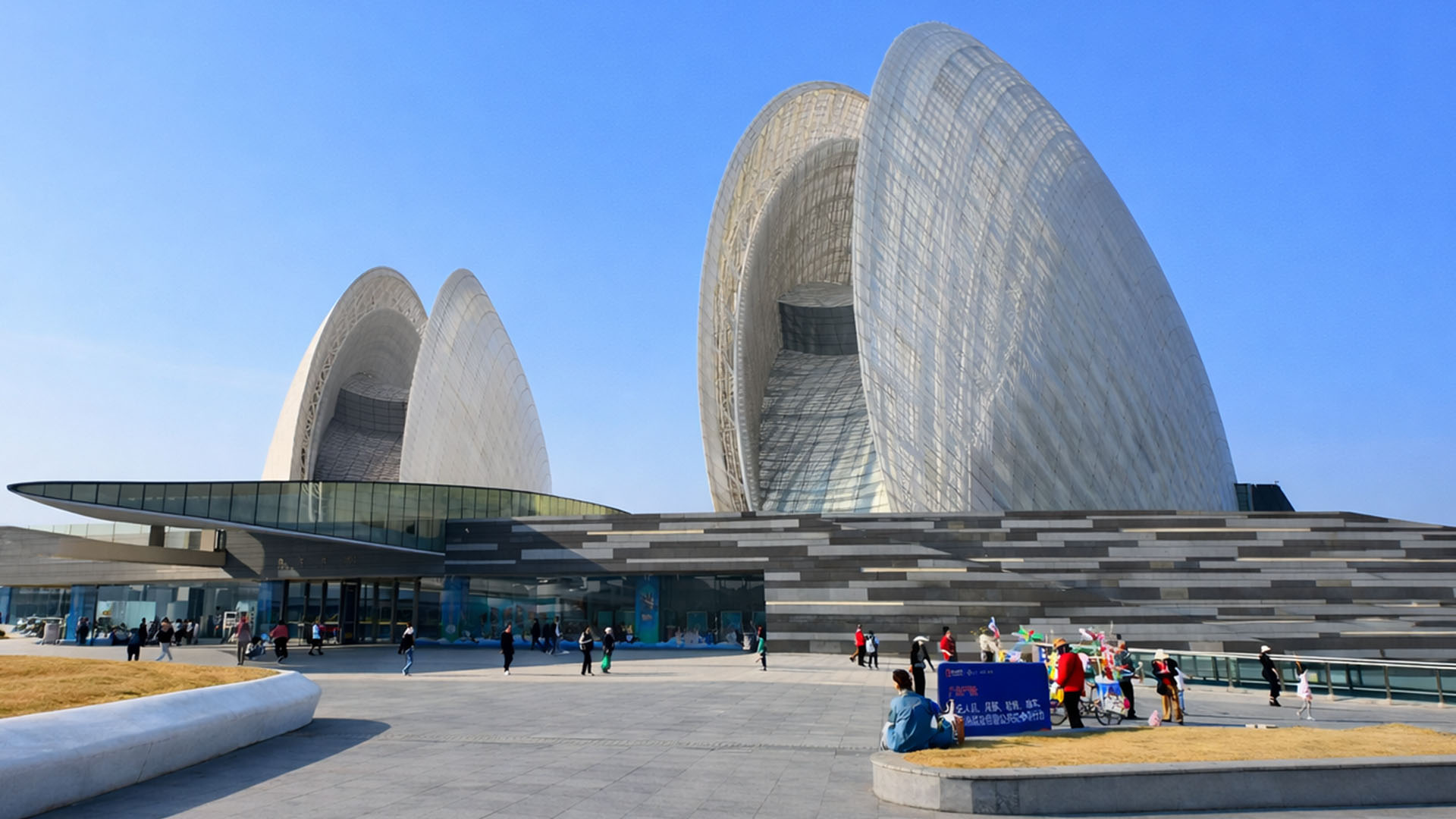 This giant architectural shell hides a massive cultural space inside