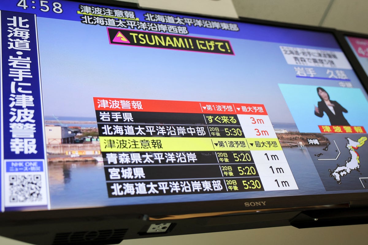 Japan earthquake live: People urged away from coast despite downgrade
