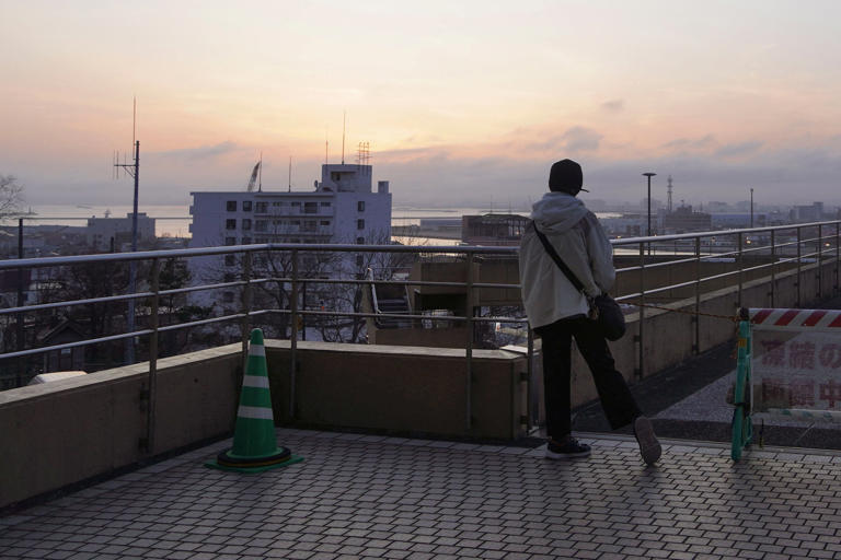 Japan earthquake live: People urged away from coast despite downgrade