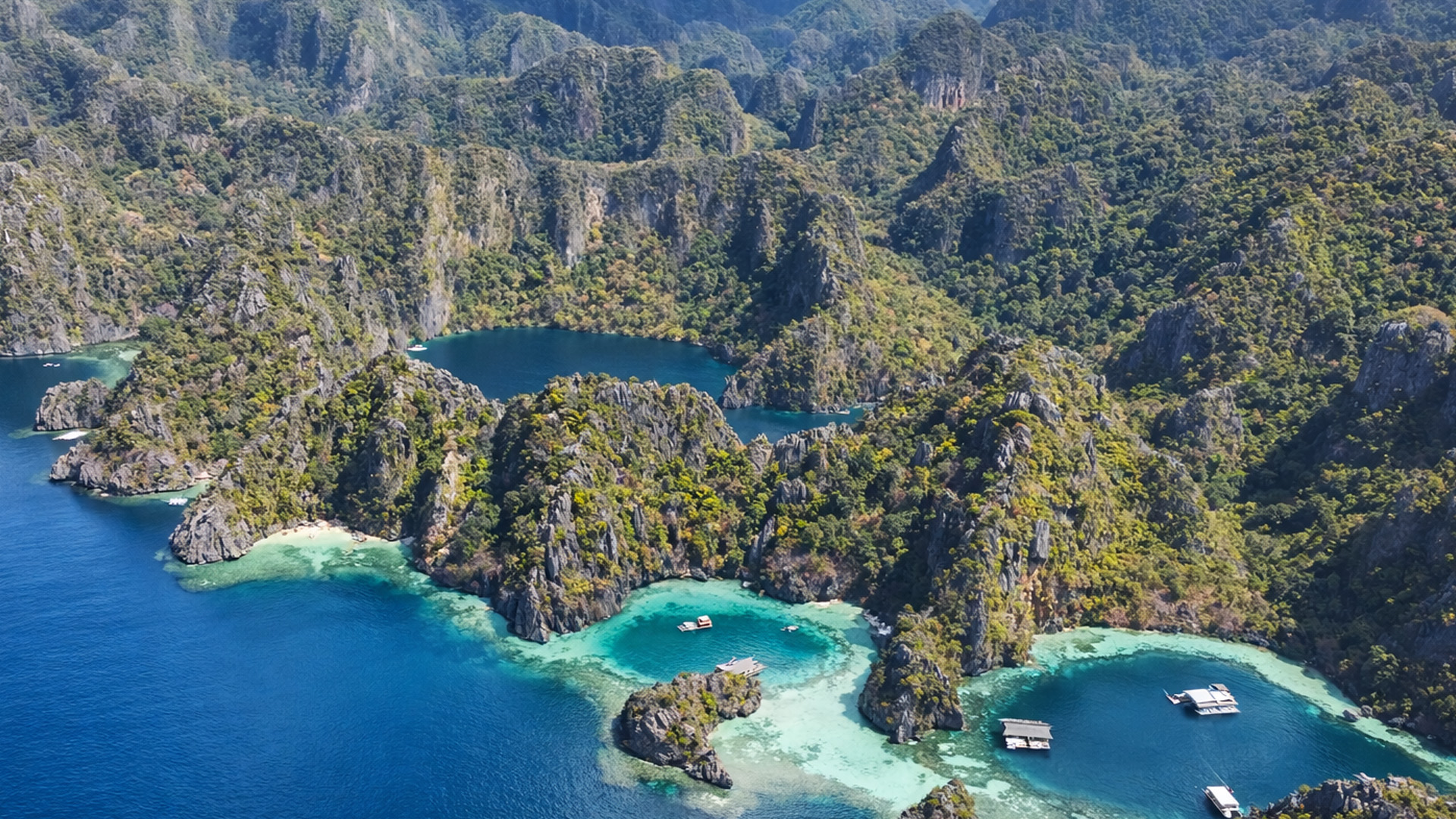 Hidden lagoon between giant cliffs