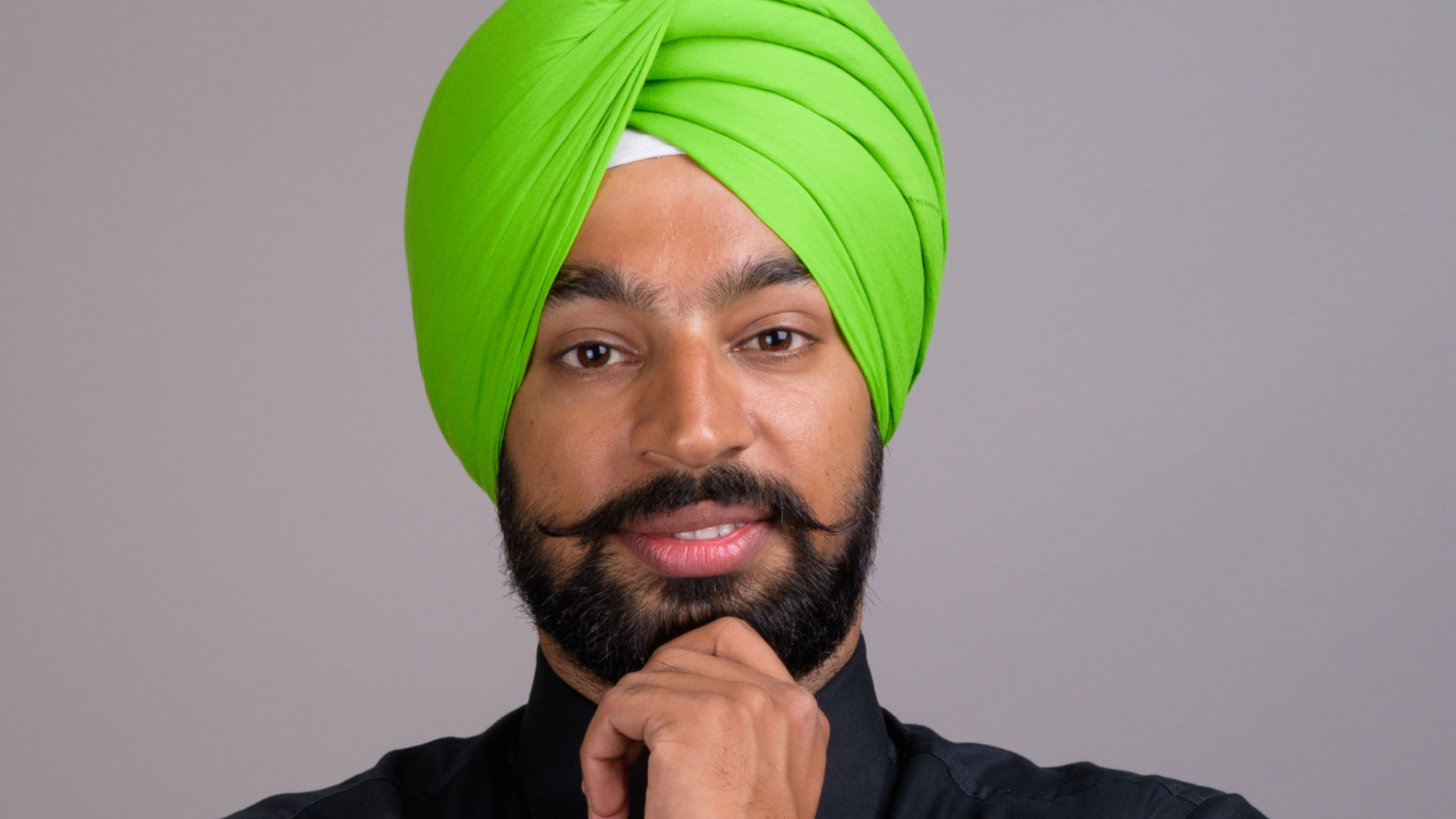 Why does the Sikh turban serve as an article of faith?