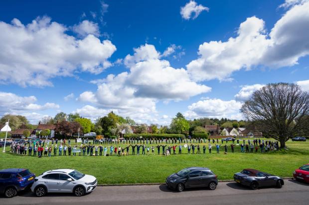 Huge human chain formed as village declared 'not for sale' amid housing ...