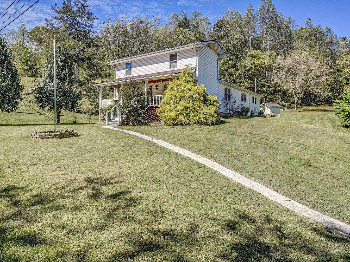 Uncover a charming 1950 farmhouse in Gate City, Virginia, nestled on 68 ...