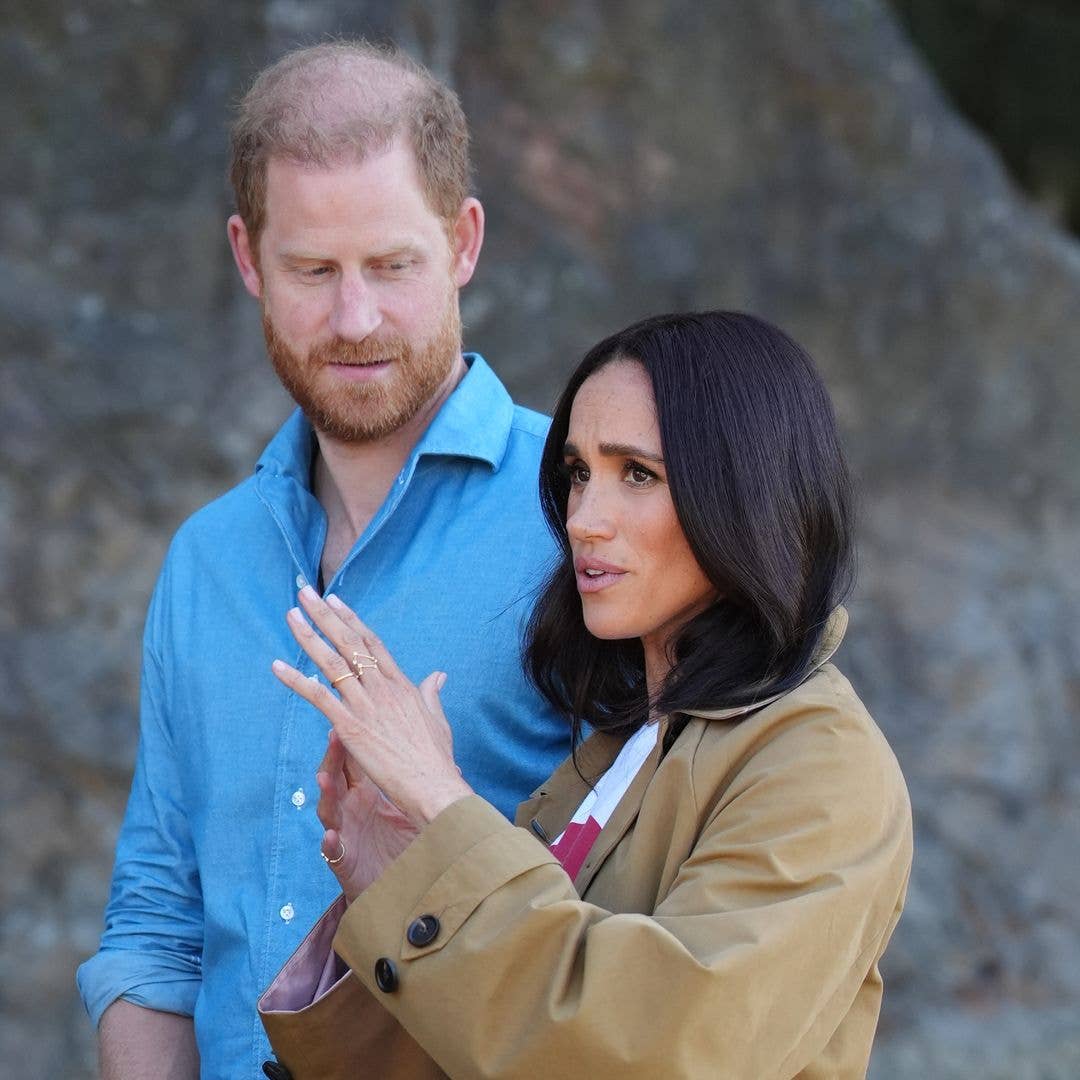 Prince Harry and Meghan Markle share kiss on the lips in blink-and-you ...