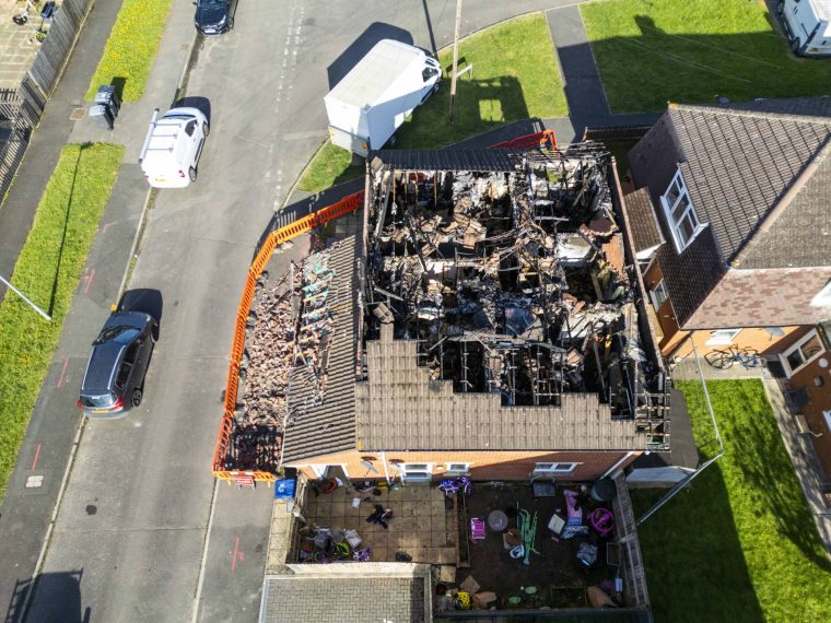 Huge fire destroys flat just hours after a family moved in