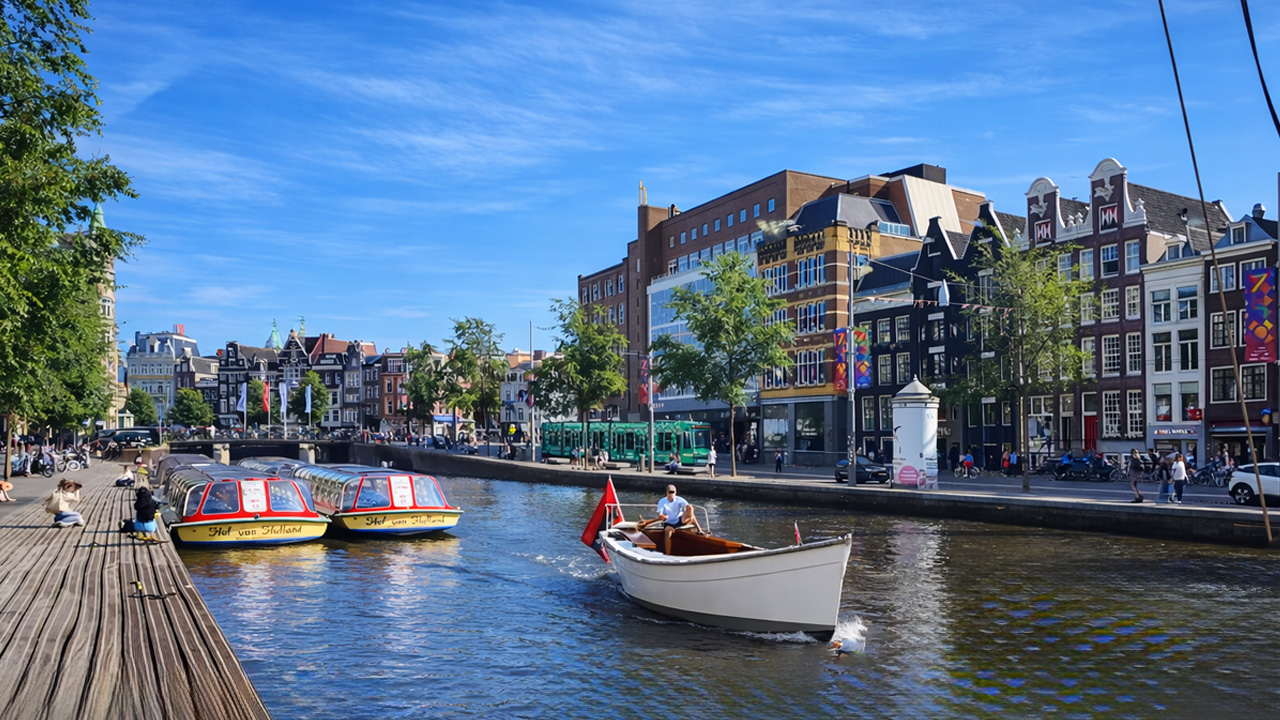 Walking along Amsterdam canals feels calm but full of life