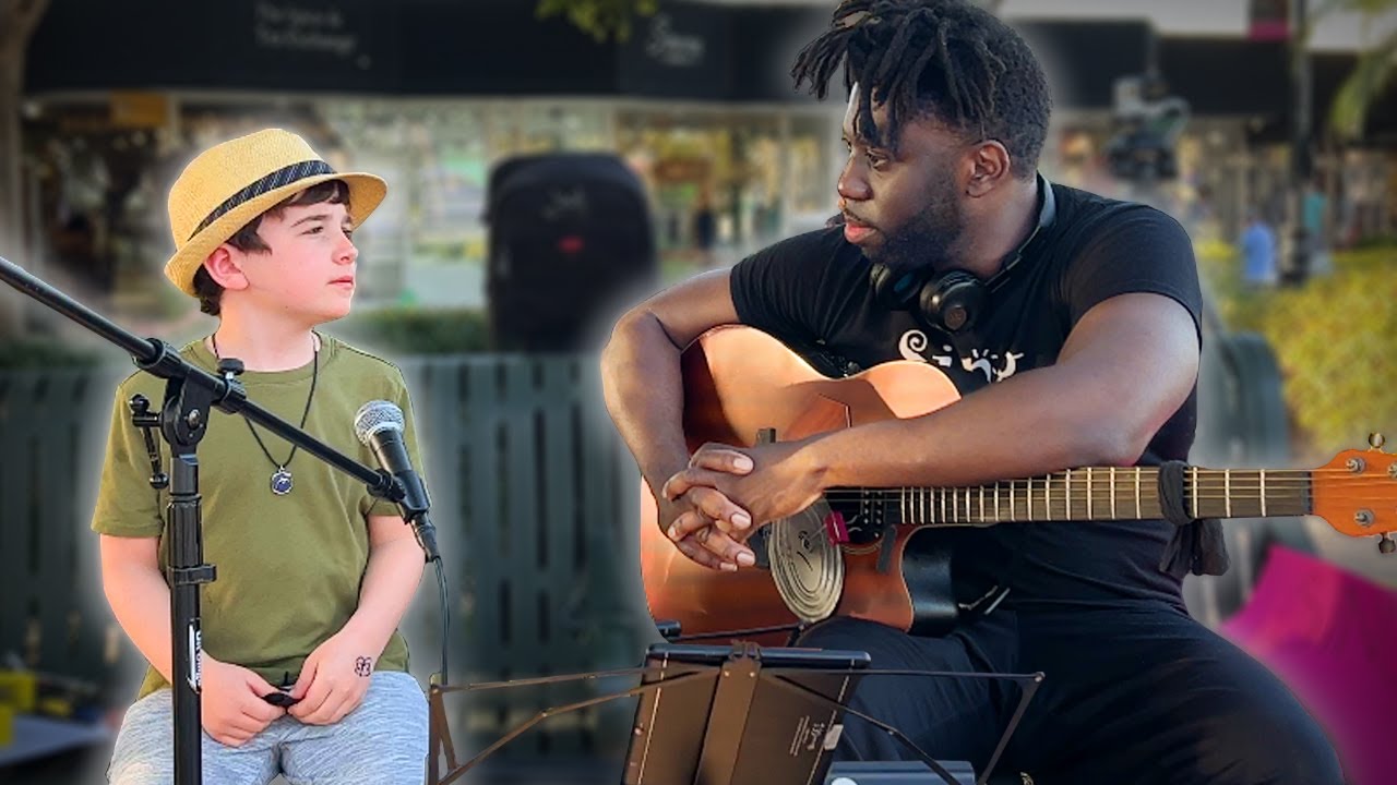 Young boy sings classic hits