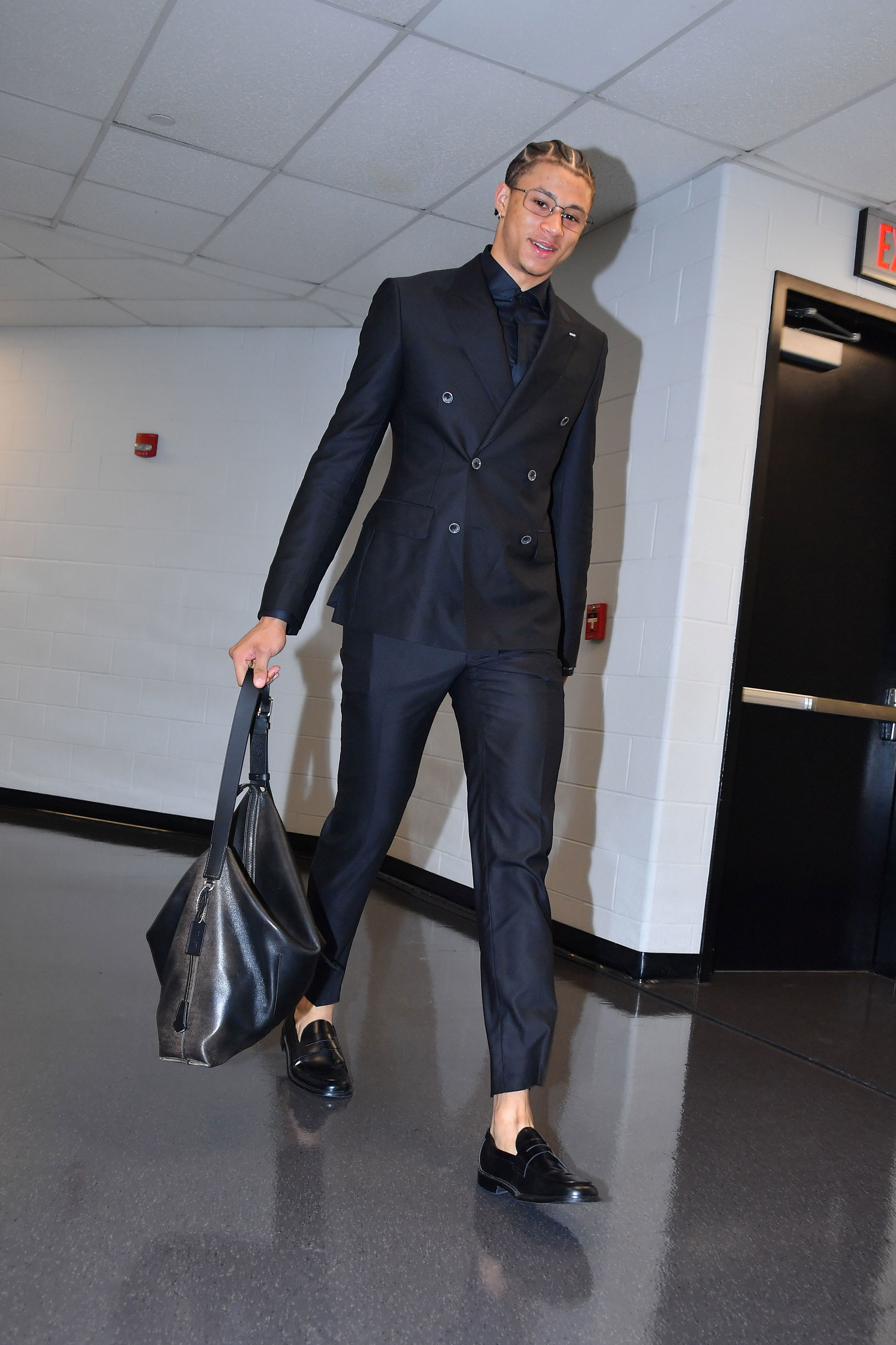 The San Antonio Spurs kicked off their playoff run in matching black suits
