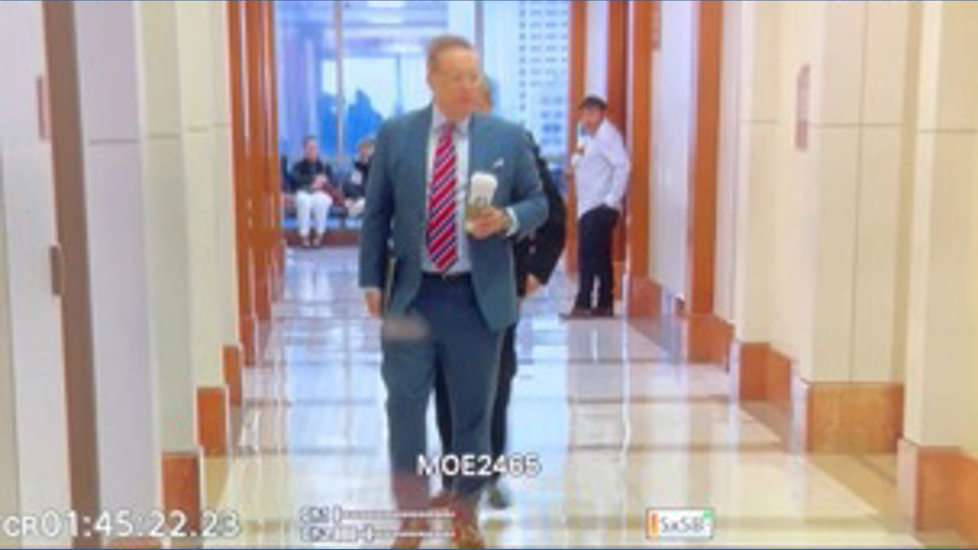 HPD lieutenant Quoc Viet Ngo arrives at court